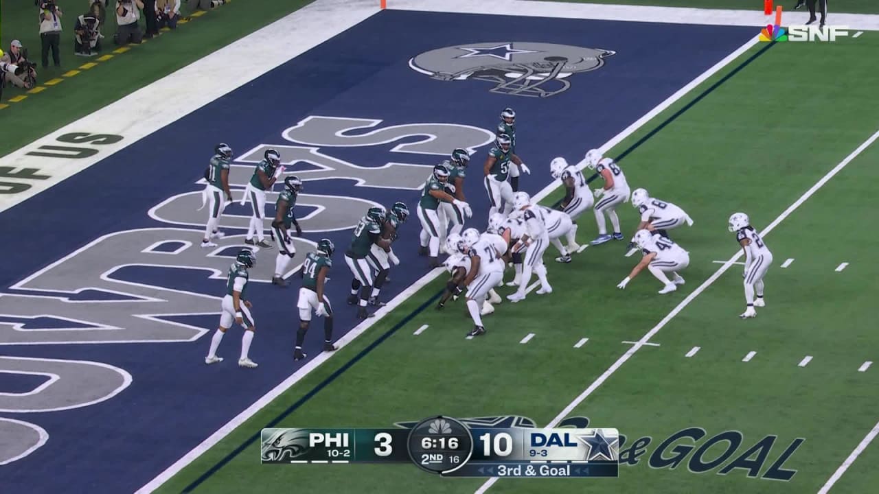 Dallas Cowboys running back Rico Dowdle barrels through a goal-line pileup for a rushing touchdown