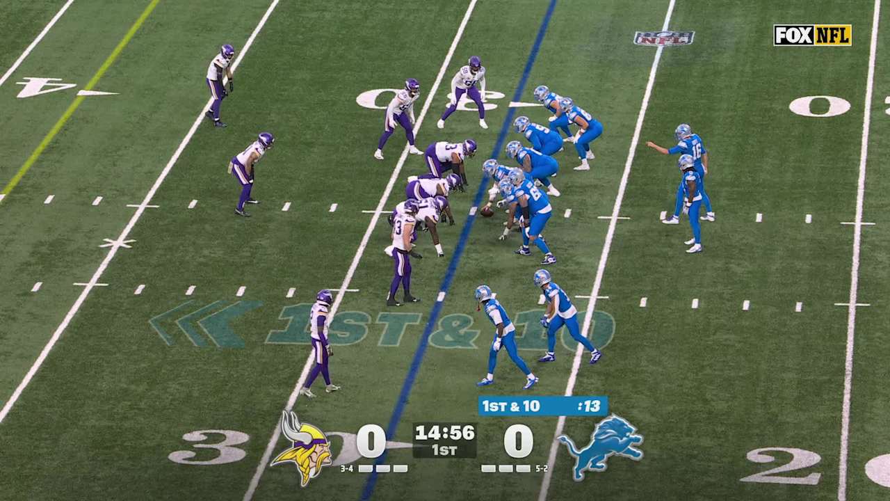 Detroit Lions tight end Sam LaPorta sidesteps a defender to pick up 15 ...