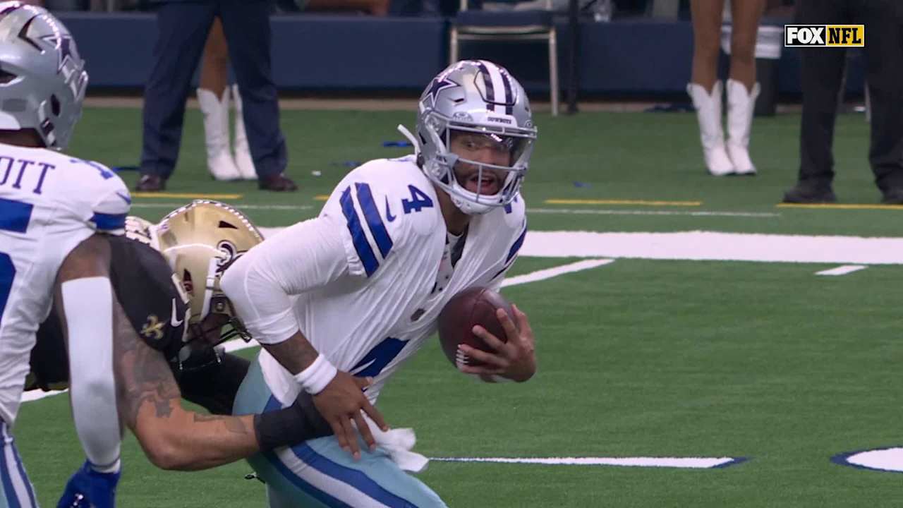 Dallas Cowboys quarterback Dak Prescott's push pass to running back ...