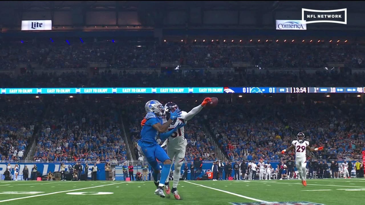 Denver Broncos safety Justin Simmons swats Detroit Lions' pass attempt