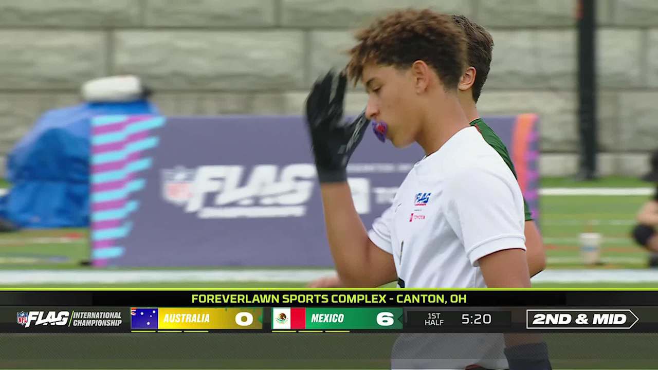 Team Australia wide receiver Jayvyn Johnson reels in strike pass from ...