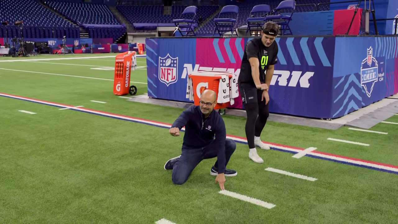 NFL Network Insider Mike Garafolo tries out to be a holder during the ...