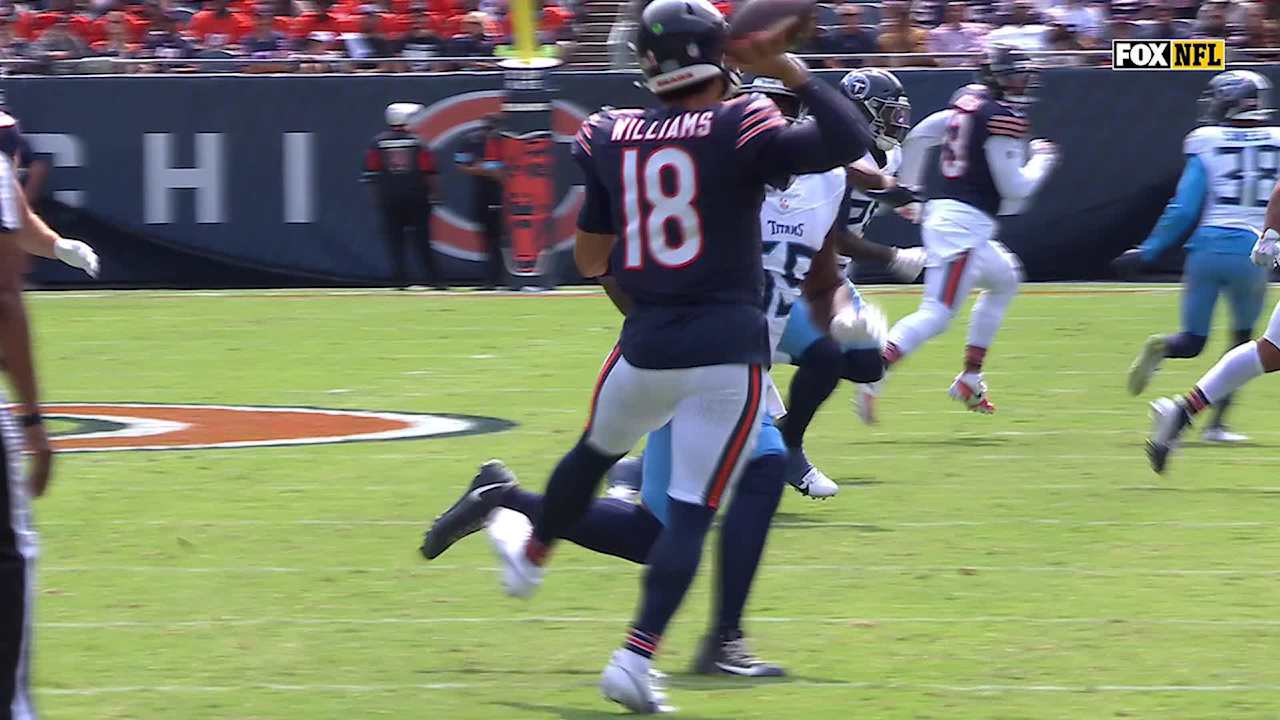 Chicago Bears quarterback Caleb Williams sprints out to his right ...