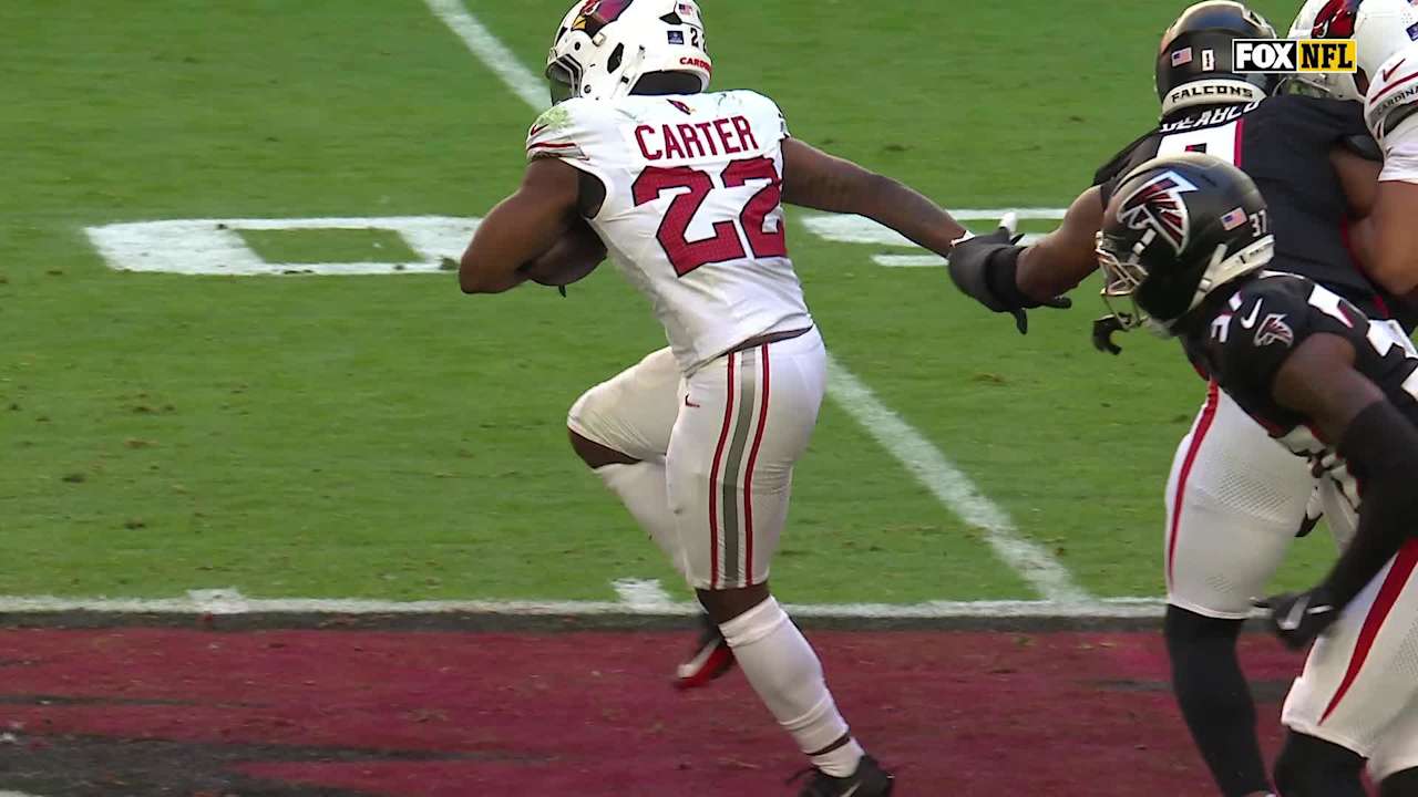 Arizona Cardinals running back Michael Carter bursts through middle of ...