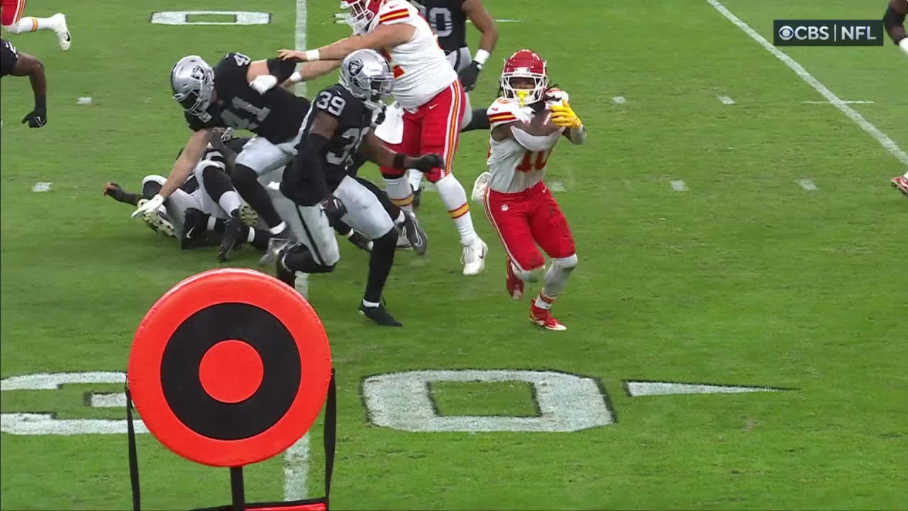 Kansas City Chiefs running back Isiah Pacheco breaks two tackles on ...