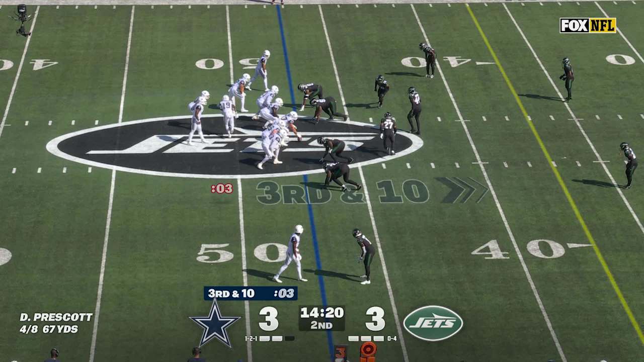 Dallas Cowboys running back Hunter Luepke charges through two Jets en ...