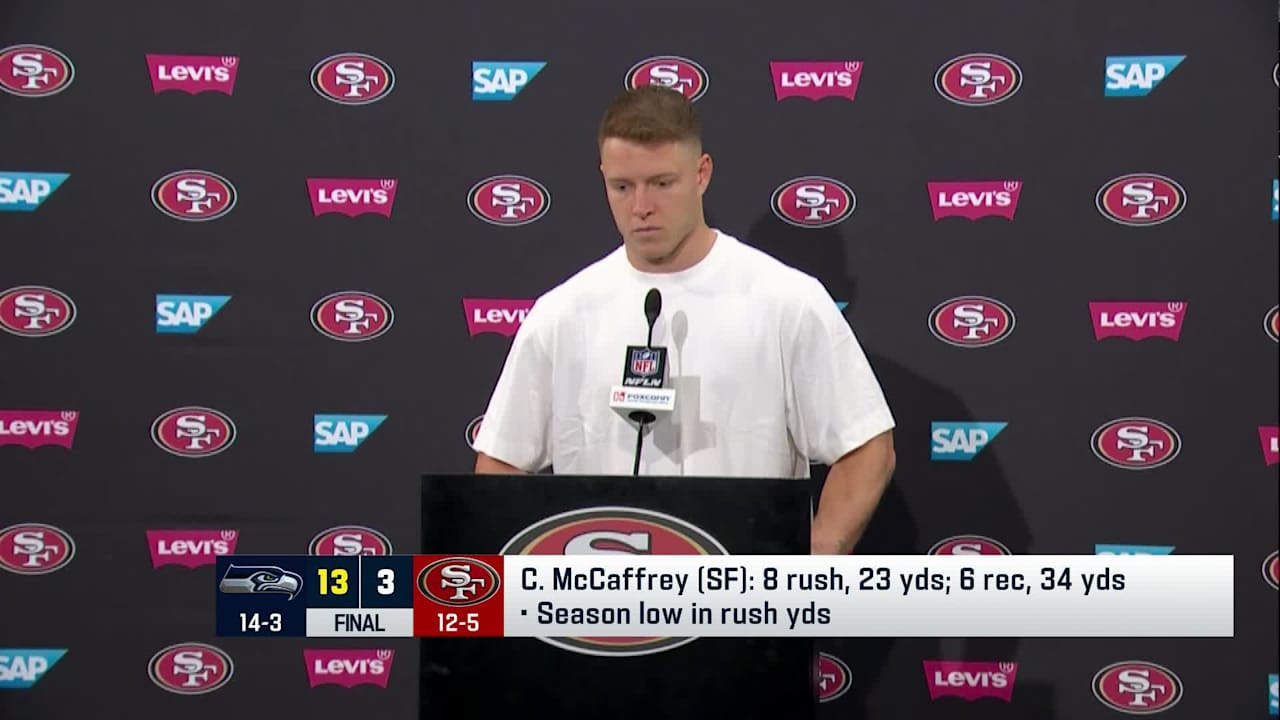 San Francisco 49ers head coach Kyle Shanahan and running back Christian ...