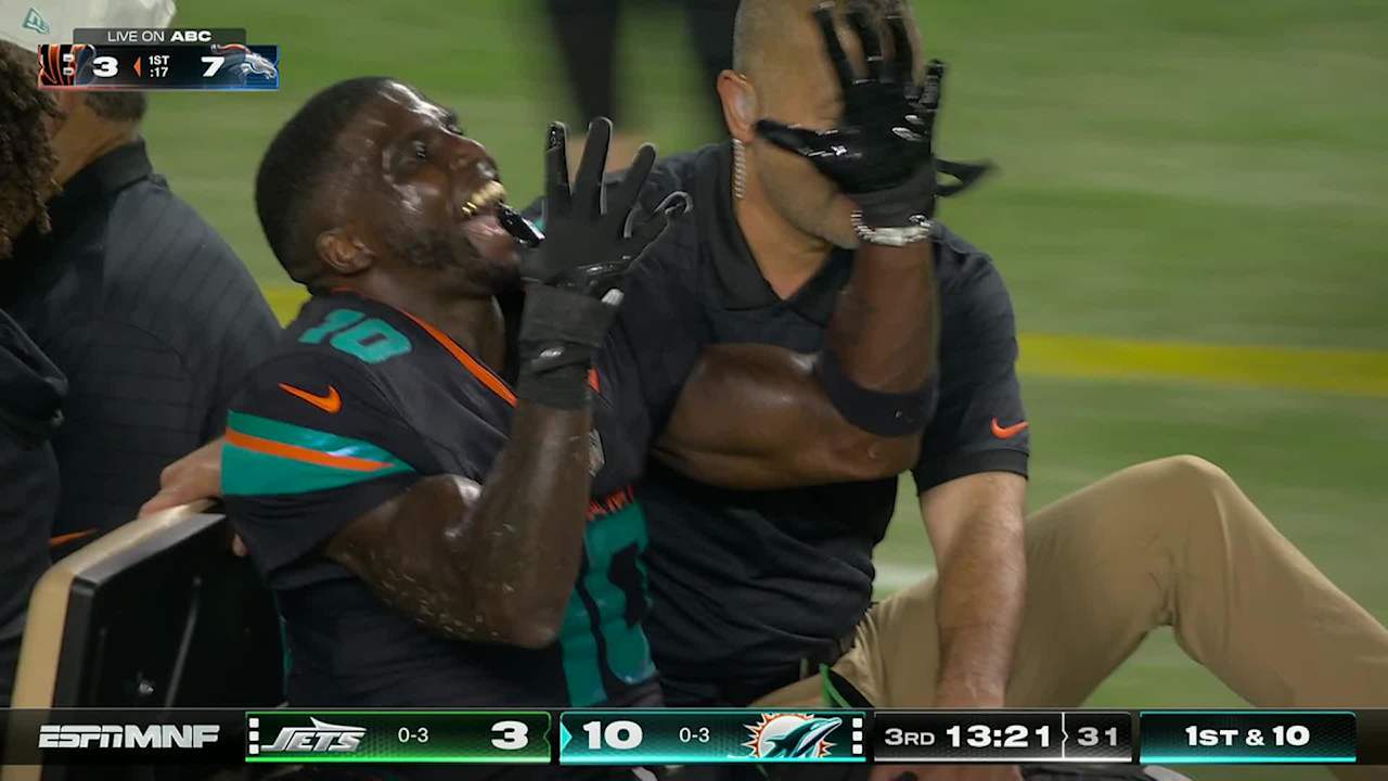 Tyreek Hill waves to fans at Hard Rock Stadium as he gets carted off ...