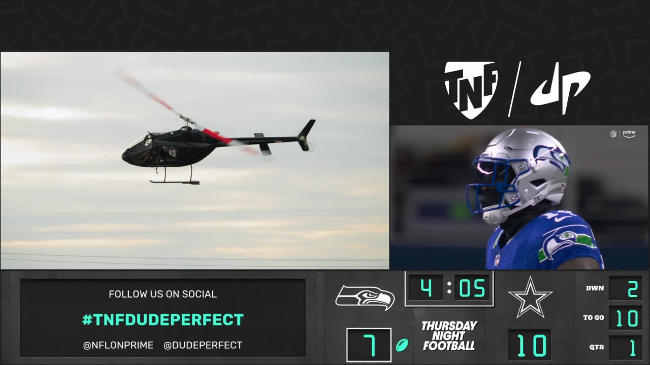 Dude Perfect entertainer Tyler Toney catches a football out of a ...