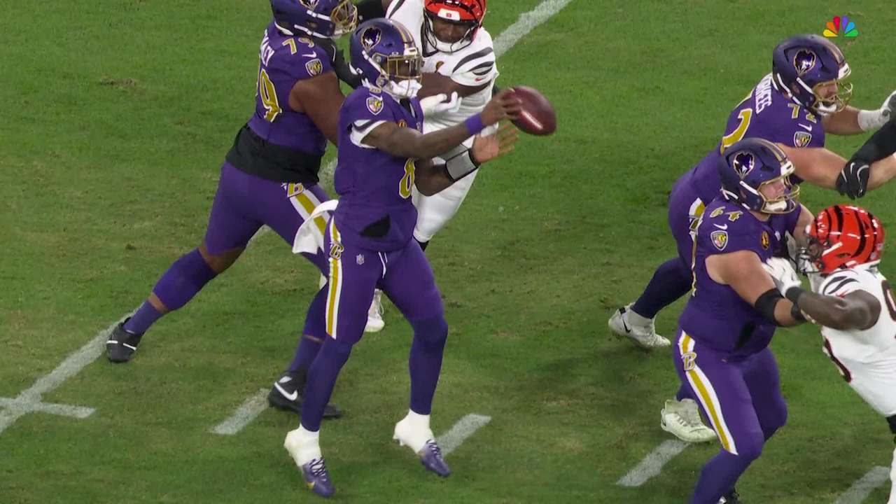 Ball slips from Baltimore Ravens quarterback Lamar Jackson's hand for ...