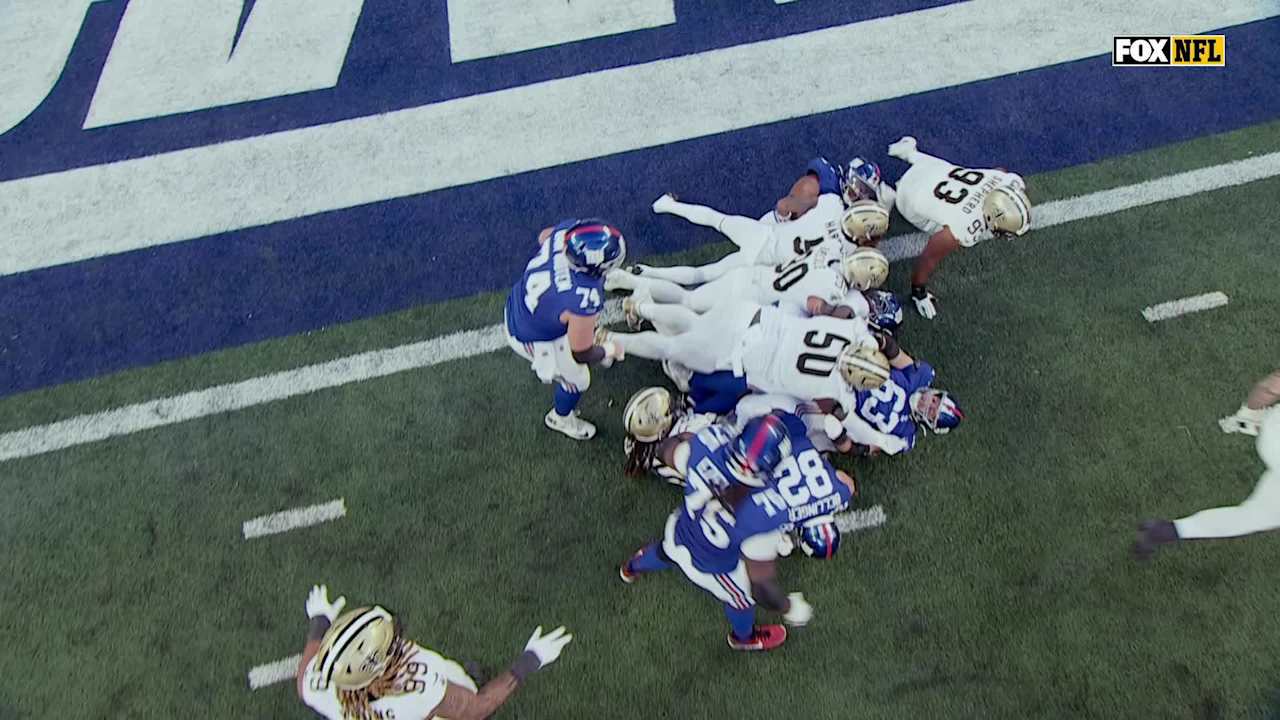 New York Giants running back Tyrone Tracy navigates his way in for ...