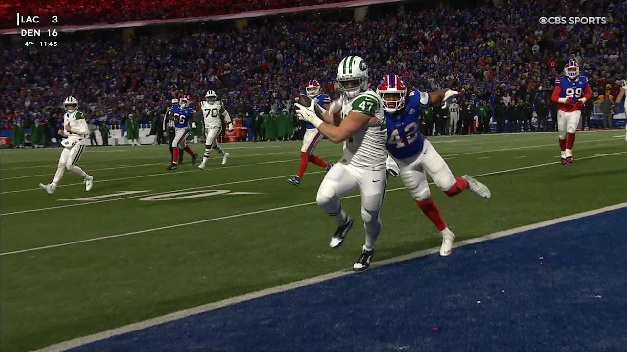 New York Jets quarterback Brady Cook beams running back Andrew Beck for ...