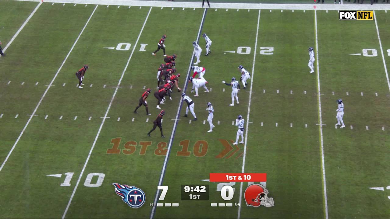 Kevin Winston wrangles Quinshon Judkins for a loss of 4 yards