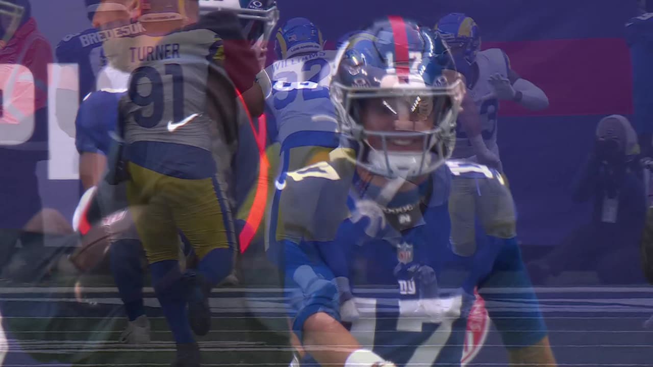 New York Giants wide receiver Wan'Dale Robinson rides behind convoy of ...