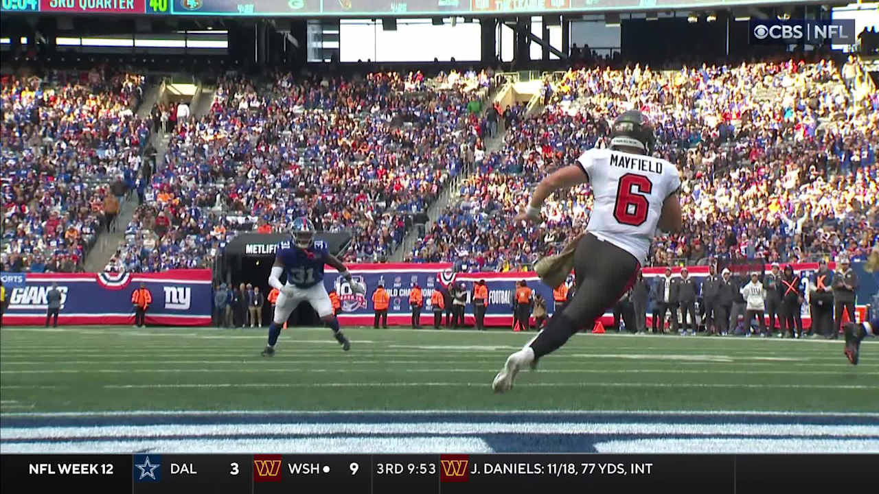 Tampa Bay Buccaneers quarterback Baker Mayfield dodges a potential ...