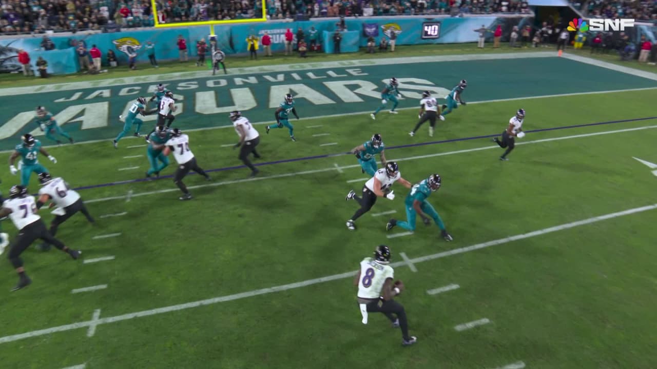 Jacksonville Jaguars defensive end Adam Gotsis contains Baltimore ...