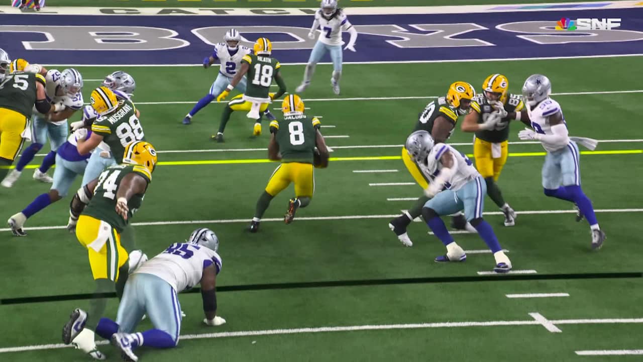 Green Bay Packers running back Josh Jacobs zig-zags his way to 18-yard ...