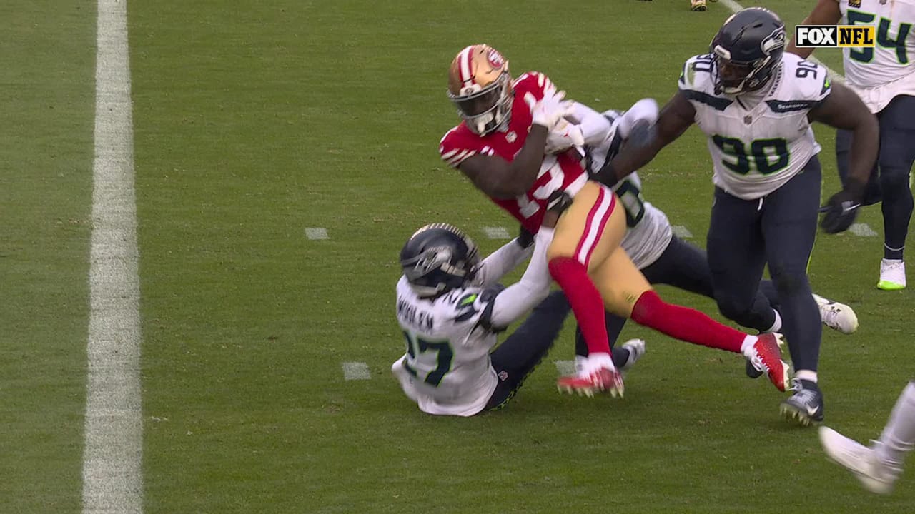 San Francisco 49ers quarterback Brock Purdy throws across his body to ...