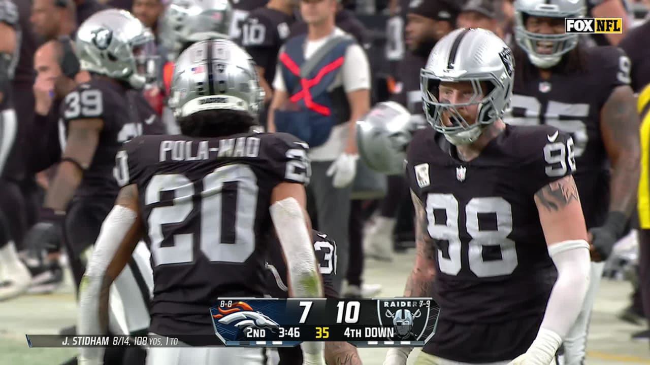 Denver Broncos quarterback Jarrett Stidham can’t outrun Las Vegas Raiders safety Isaiah Pola-Mao ...