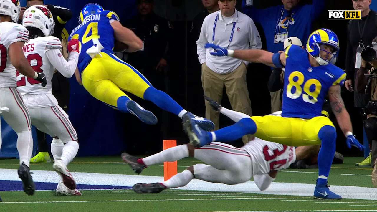 Los Angeles Rams tight end Colby Parkinson leaps over the goal line to ...