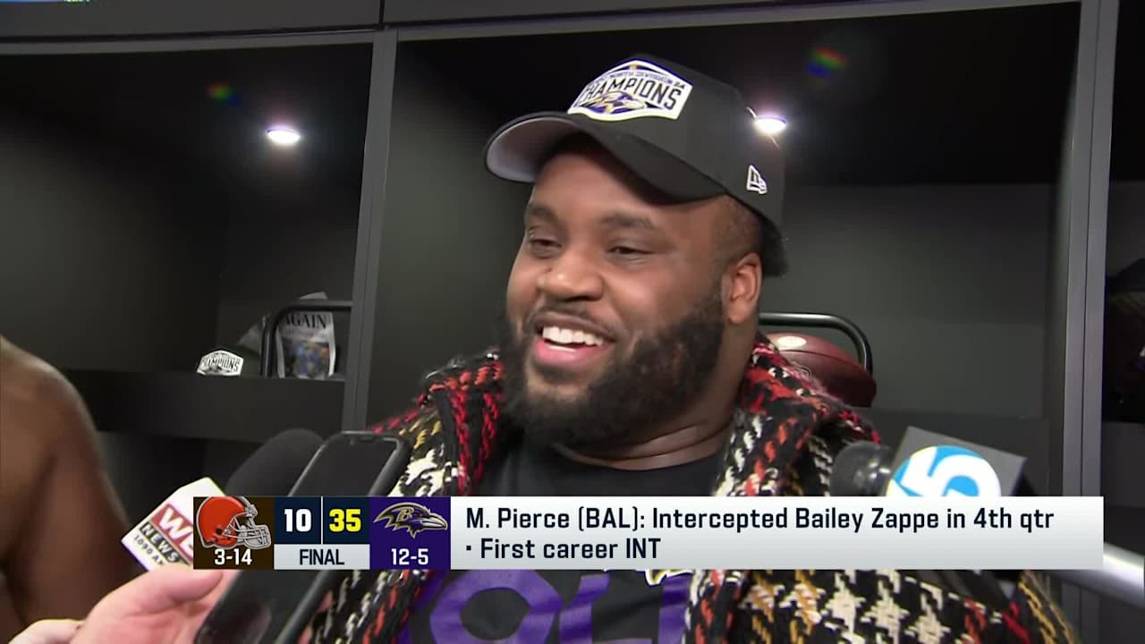 Baltimore Ravens defensive tackle Michael Pierce reacts to his INT in ...