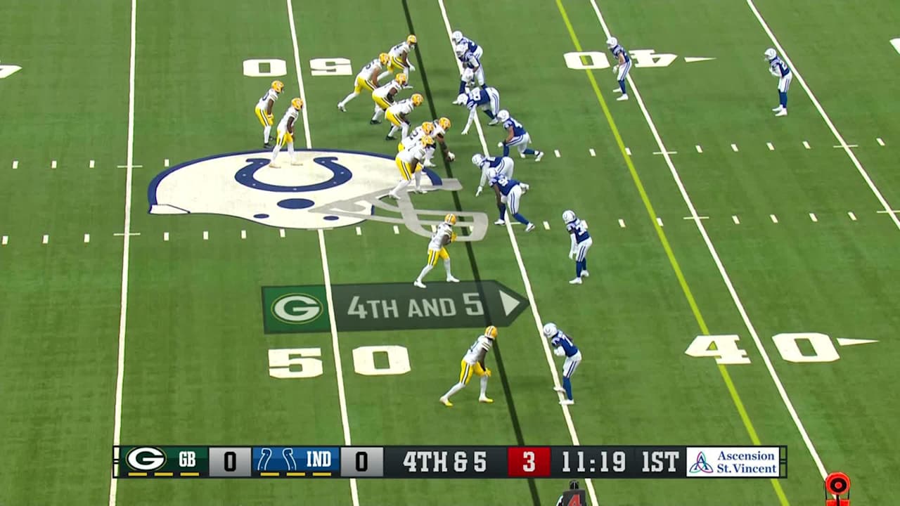 Green Bay Packers quarterback Malik Willis runs in a circle before ...