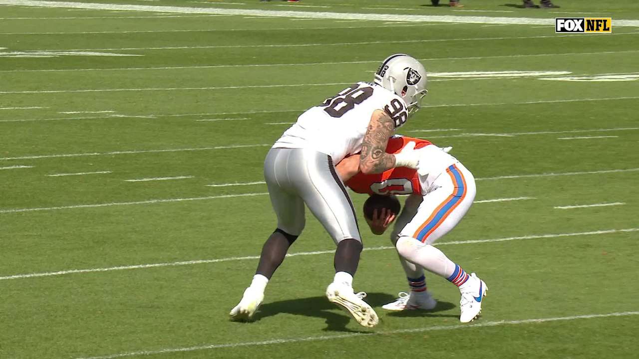 Las Vegas Raiders defensive end Maxx Crosby engulfs Broncos quarterback ...