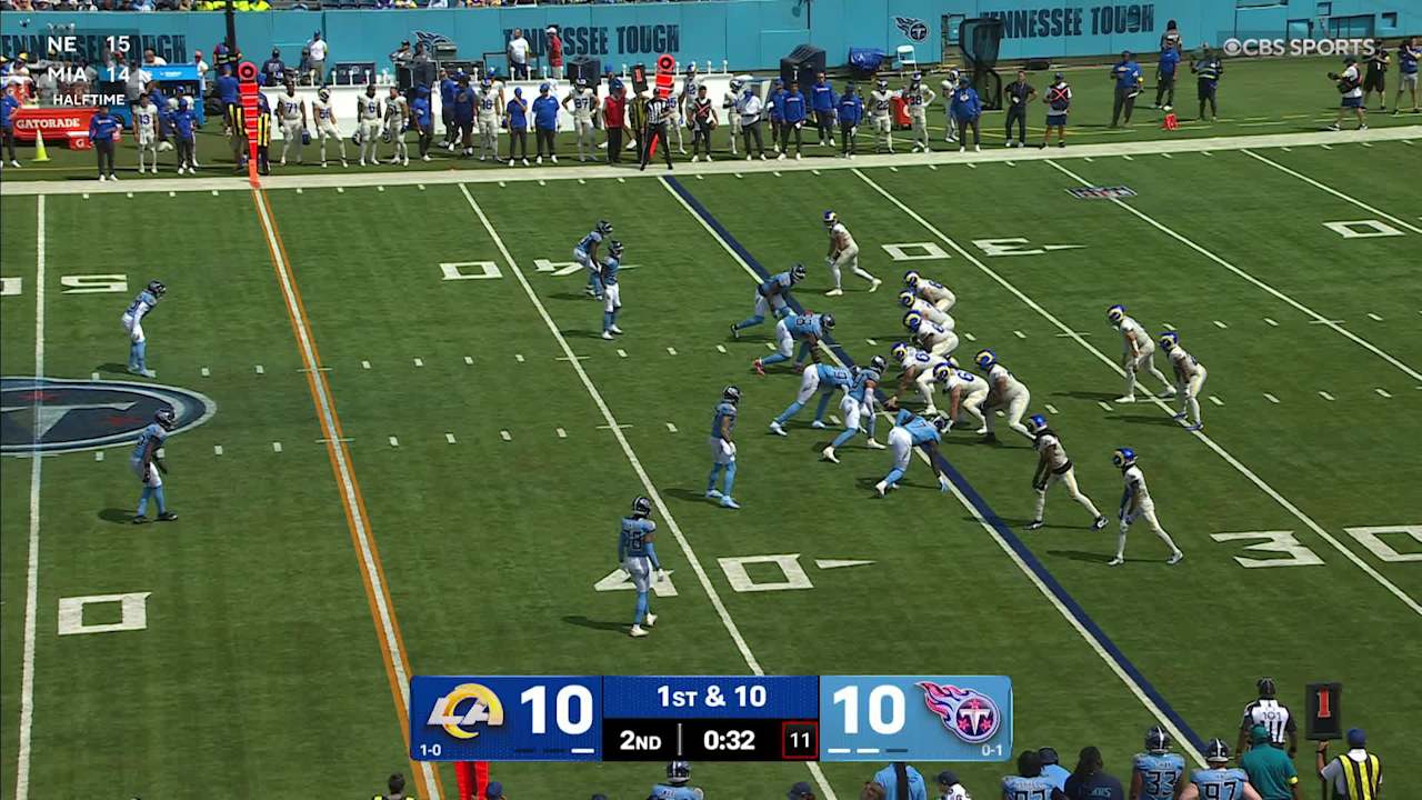 Los Angeles Rams quarterback Matthew Stafford fires deep to wide receiver Davante Adams for a 26 ...