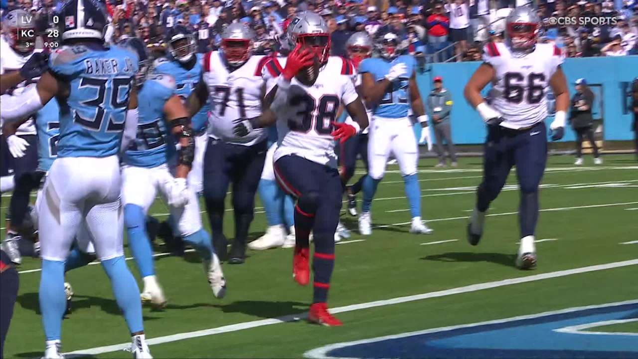 New England Patriots running back Rhamondre Stevenson walks into end ...